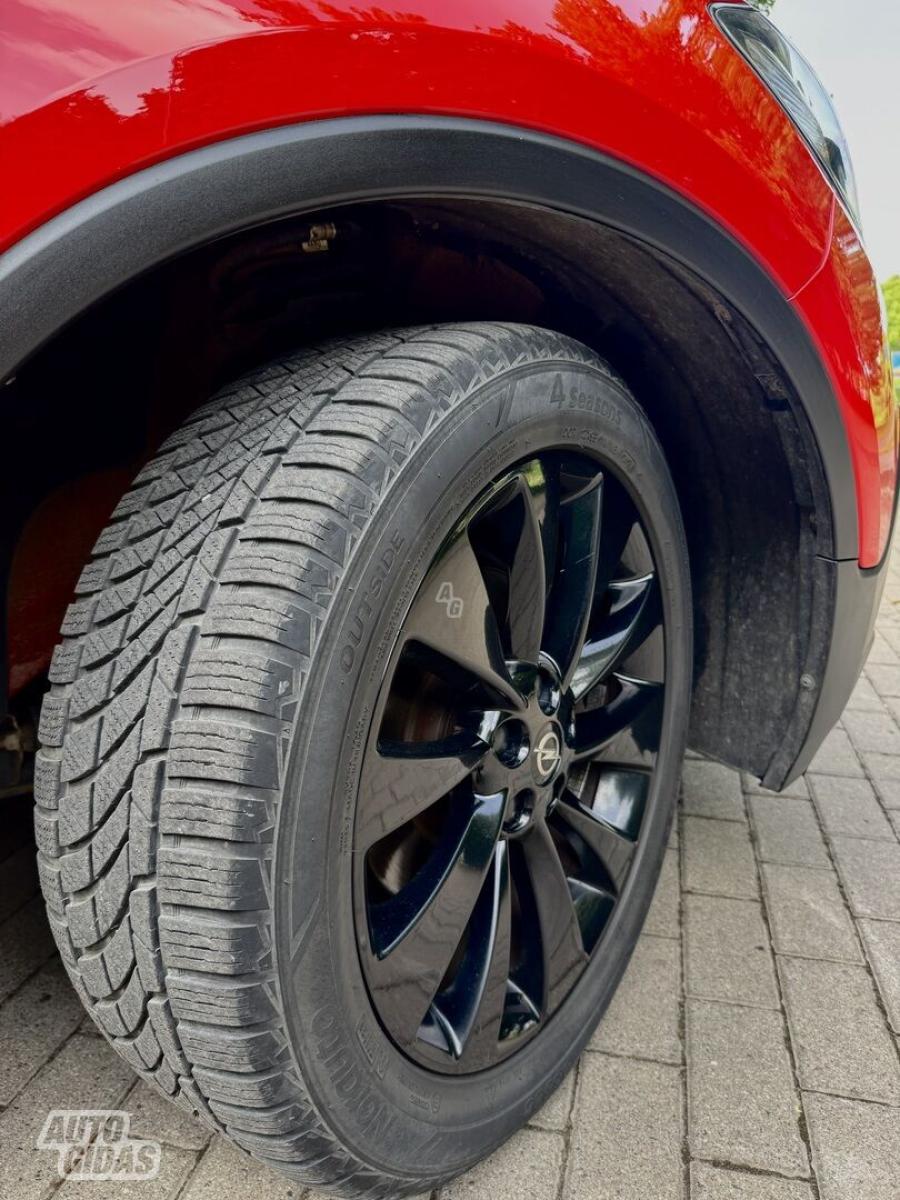 Red Opel Mokka 2016 in Taurage, with an engine capacity of 1.60 L and mileage of 216 thousand km for 7300 €, photo 26 on AUTOMOTO.COM.LV