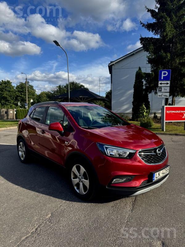Red Opel Mokka 2018 in Riga, with an engine capacity of 1.60 L and mileage of 82 thousand km for 10400 €, photo 1 on AUTOMOTO.COM.LV