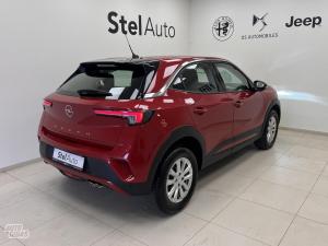 Red Opel Mokka 2021 in Vilnius, with an engine capacity of 1.20 L and mileage of 24 thousand km for 15990 €, photo 6 on AUTOMOTO.COM.LV