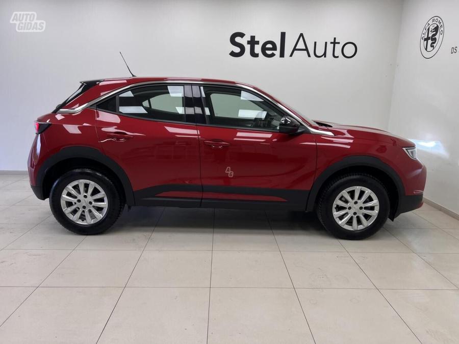 Red Opel Mokka 2021 in Vilnius, with an engine capacity of 1.20 L and mileage of 24 thousand km for 15990 €, photo 7 on AUTOMOTO.COM.LV