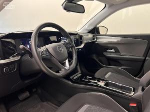 Red Opel Mokka 2021 in Vilnius, with an engine capacity of 1.20 L and mileage of 24 thousand km for 15990 €, photo 11 on AUTOMOTO.COM.LV