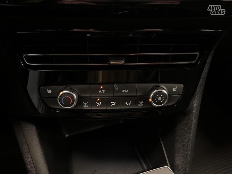 Red Opel Mokka 2021 in Vilnius, with an engine capacity of 1.20 L and mileage of 24 thousand km for 15990 €, photo 17 on AUTOMOTO.COM.LV