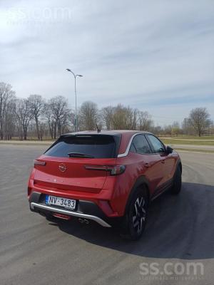 Red Opel Mokka 2022 in Riga, with an engine capacity of 1.20 L and mileage of 31 thousand km for 16000 €, photo 3 on AUTOMOTO.COM.LV