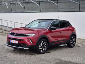 Красный Опель Mokka 2022 в Рига, объемом двигателя 0.00 л и пробегом 54 тыс. км за 18850 €, фото  на AUTOMOTO.COM.LV