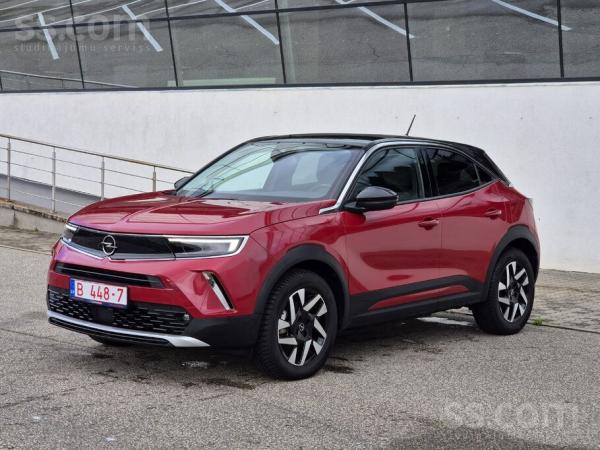 Red Opel Mokka 2022 in Riga, with an engine capacity of 0.00 L and mileage of 54 thousand km for 18850 €, photo 1 on AUTOMOTO.COM.LV