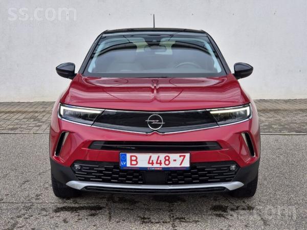 Red Opel Mokka 2022 in Riga, with an engine capacity of 0.00 L and mileage of 54 thousand km for 18850 €, photo 3 on AUTOMOTO.COM.LV