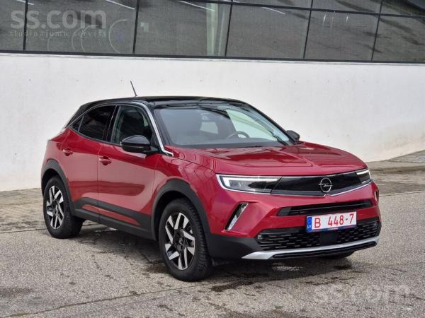 Red Opel Mokka 2022 in Riga, with an engine capacity of 0.00 L and mileage of 54 thousand km for 18850 €, photo 4 on AUTOMOTO.COM.LV