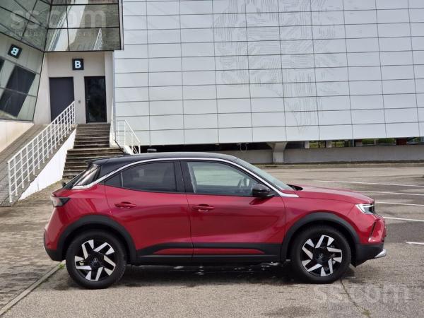 Red Opel Mokka 2022 in Riga, with an engine capacity of 0.00 L and mileage of 54 thousand km for 18850 €, photo 5 on AUTOMOTO.COM.LV