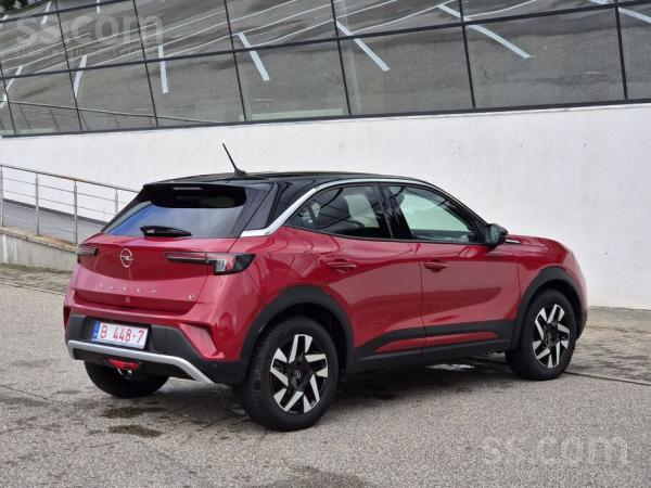 Red Opel Mokka 2022 in Riga, with an engine capacity of 0.00 L and mileage of 54 thousand km for 18850 €, photo 9 on AUTOMOTO.COM.LV