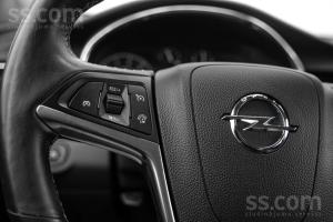 Red Opel Mokka 2017 in Riga, with an engine capacity of 1.40 L and mileage of 134 thousand km for 10990 €, photo 18 on AUTOMOTO.COM.LV