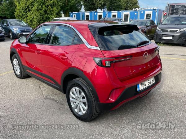 Red Opel Mokka 2021 in Tartu, with an engine capacity of 1.20 L and mileage of 89 thousand km for 15990 €, photo 4 on AUTOMOTO.COM.LV