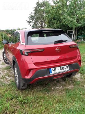 Красный Опель Mokka 2021 в Рига, объемом двигателя 1.20 л и пробегом 94 тыс. км за 11500 €, фото  на AUTOMOTO.COM.LV
