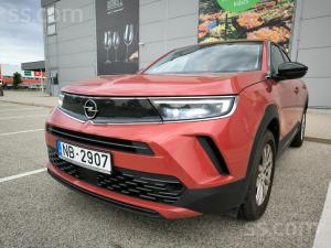 Red Opel Mokka 2022 in Liepaja, with an engine capacity of 1.20 L and mileage of 66 thousand km for 12700 €, photo  on AUTOMOTO.COM.LV