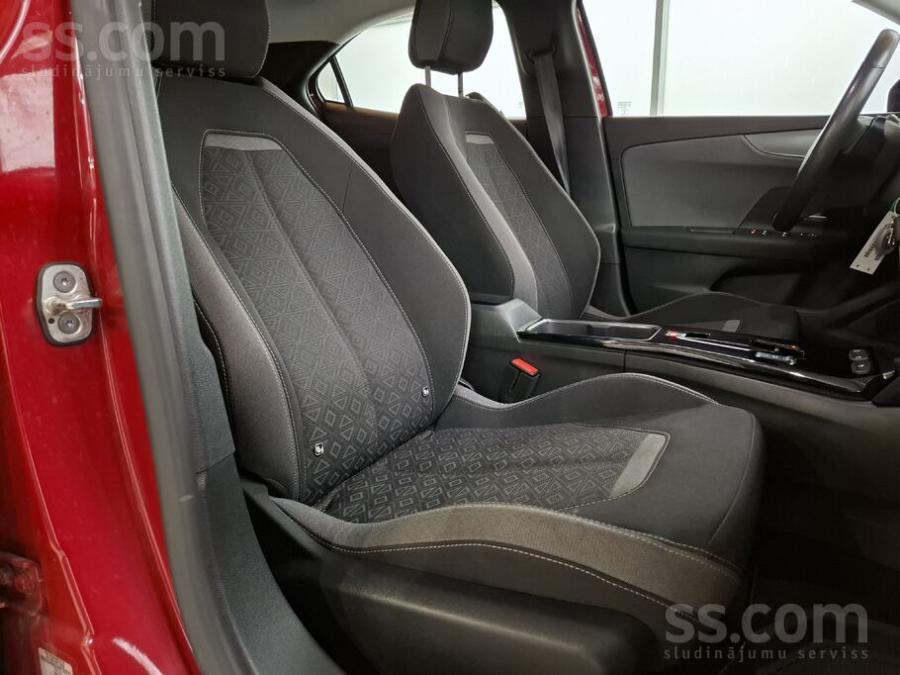 Red Opel Mokka 2023 in Riga, with an engine capacity of 1.20 L and mileage of 60 thousand km for 17500 €, photo 9 on AUTOMOTO.COM.LV