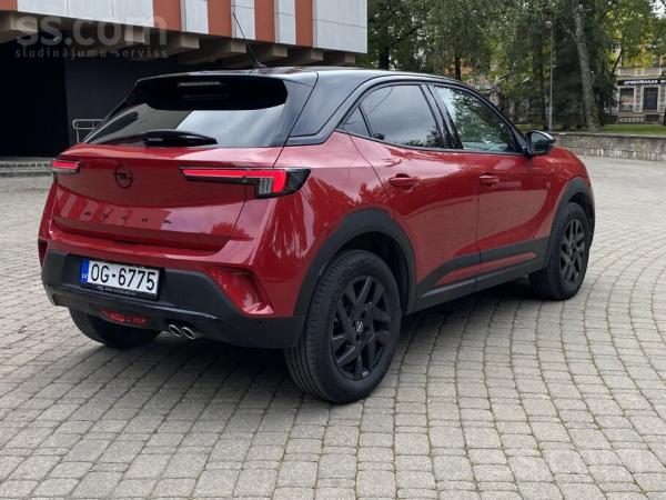 Sarkans Opel Mokka 2023 Daugavpils, ar dzinēja tilpumu 1.20 L un nobraukumu 0 tūkst. km par 19800 €, foto 4 vietnē AUTOMOTO.COM.LV