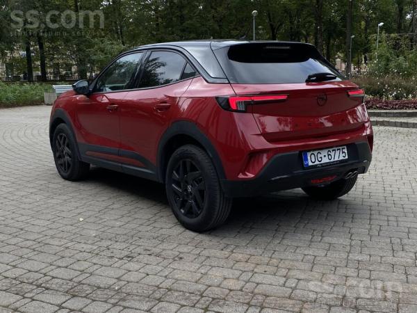 Sarkans Opel Mokka 2023 Daugavpils, ar dzinēja tilpumu 1.20 L un nobraukumu 0 tūkst. km par 19800 €, foto 6 vietnē AUTOMOTO.COM.LV