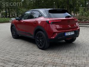 Sarkans Opel Mokka 2023 Daugavpils, ar dzinēja tilpumu 1.20 L un nobraukumu 0 tūkst. km par 19800 €, foto 7 vietnē AUTOMOTO.COM.LV