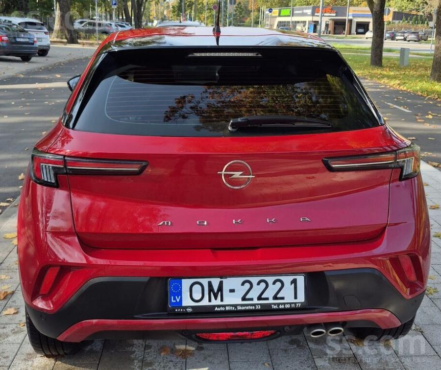 Red Opel Mokka 2023 in Riga, with an engine capacity of 1.20 L and mileage of 65 thousand km for 14000 €, photo 3 on AUTOMOTO.COM.LV