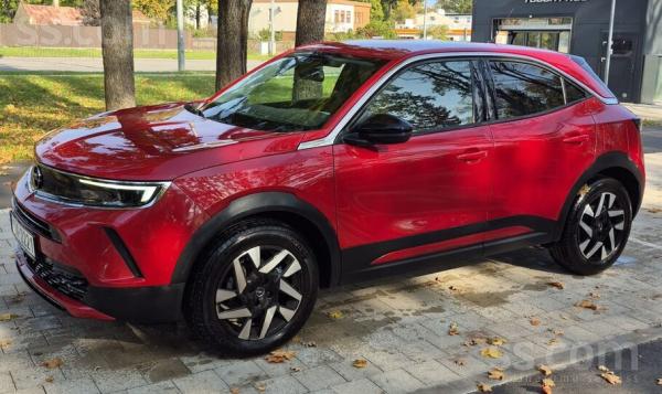 Red Opel Mokka 2023 in Riga, with an engine capacity of 1.20 L and mileage of 65 thousand km for 14000 €, photo 5 on AUTOMOTO.COM.LV