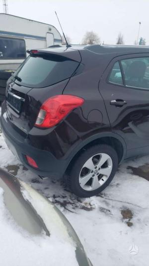 Red Opel Mokka 2013 in Marijampole, with an engine capacity of 1.70 L and mileage of 240 thousand km for 5700 €, photo 5 on AUTOMOTO.COM.LV