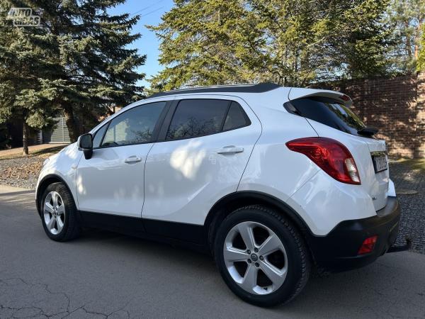 White Opel Mokka 2013 in Kaunas, with an engine capacity of 1.70 L and mileage of 317 thousand km for 4450 €, photo 6 on AUTOMOTO.COM.LV