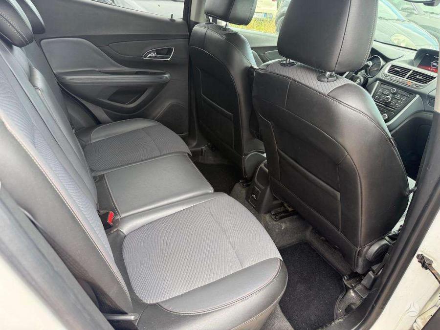 White Opel Mokka 2014 in Siauliai, with an engine capacity of 1.69 L and mileage of 240 thousand km for 5950 €, photo 13 on AUTOMOTO.COM.LV