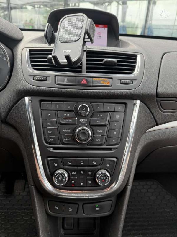 White Opel Mokka 2014 in Vilnius, with an engine capacity of 1.69 L and mileage of 125 thousand km for 6950 €, photo 6 on AUTOMOTO.COM.LV
