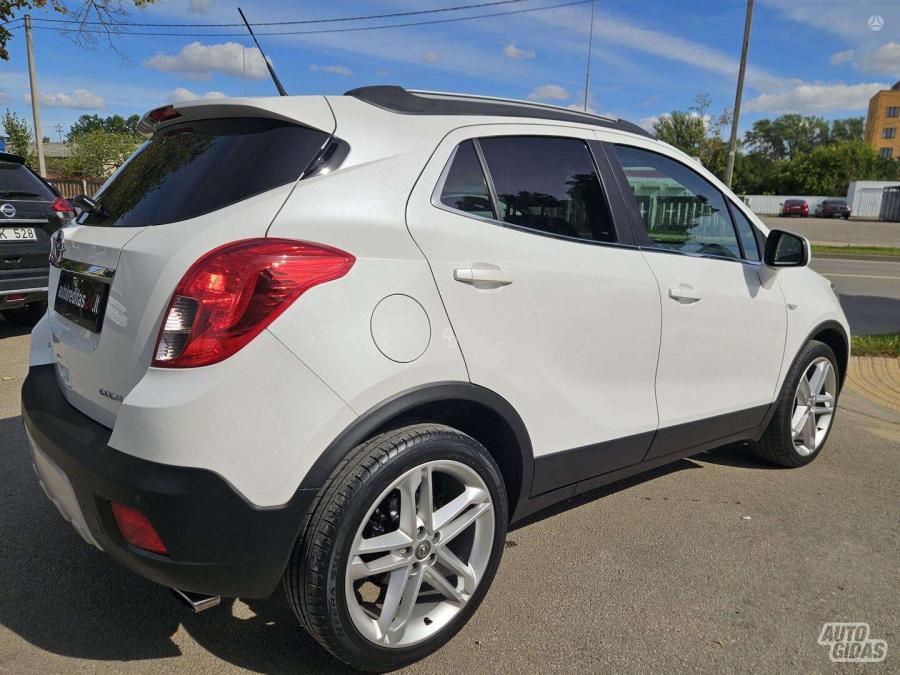 White Opel Mokka 2014 in Siauliai, with an engine capacity of 1.70 L and mileage of 239 thousand km for 7450 €, photo 6 on AUTOMOTO.COM.LV