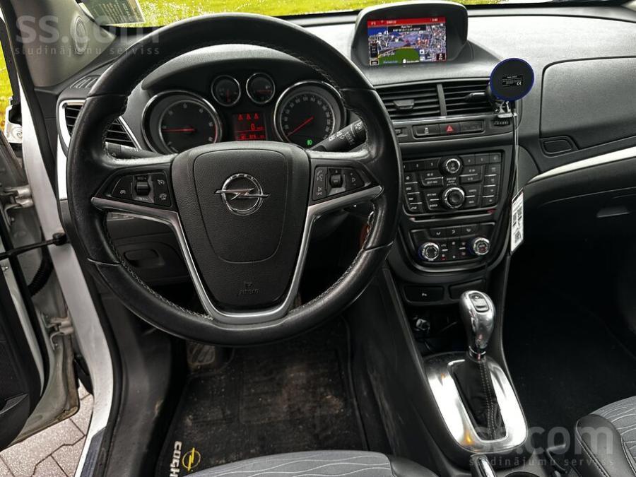 White Opel Mokka 2015 in Riga, with an engine capacity of 1.60 L and mileage of 157 thousand km for 8250 €, photo 11 on AUTOMOTO.COM.LV