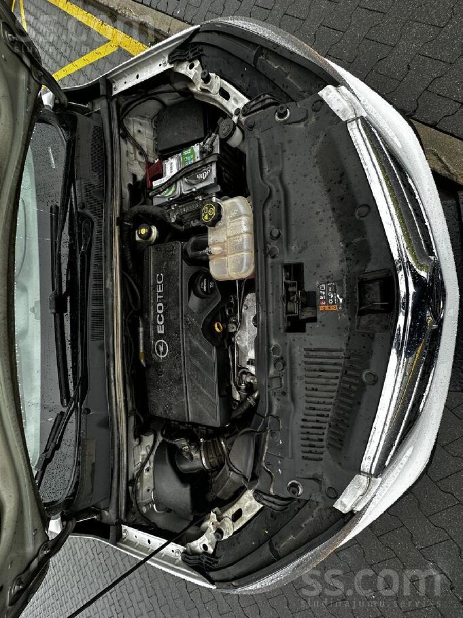 White Opel Mokka 2015 in Riga, with an engine capacity of 1.60 L and mileage of 157 thousand km for 8250 €, photo 14 on AUTOMOTO.COM.LV