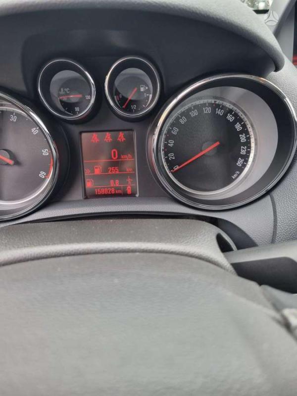 White Opel Mokka 2015 in Taurage, with an engine capacity of 1.60 L and mileage of 156 thousand km for 6200 €, photo 7 on AUTOMOTO.COM.LV