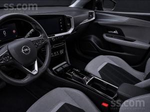 White Opel Mokka 2021 in Riga, with an engine capacity of 1.40 L and mileage of 70 thousand km for 17500 €, photo 4 on AUTOMOTO.COM.LV
