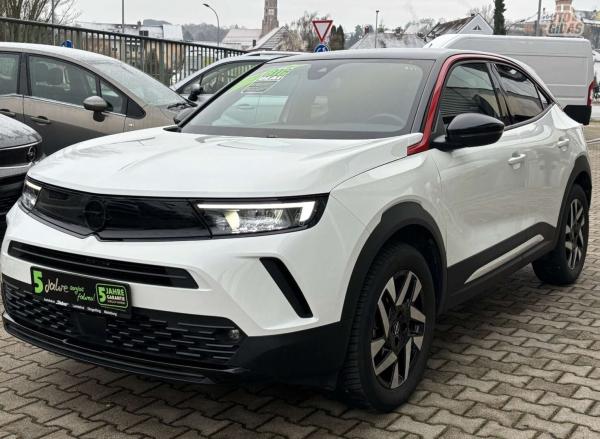 White Opel Mokka 2022 in Kaunas, with an engine capacity of 1.20 L and mileage of 21 thousand km for 22735 €, photo 2 on AUTOMOTO.COM.LV