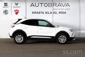 White Opel Mokka 2022 in Riga, with an engine capacity of 1.20 L and mileage of 68 thousand km for 15490 €, photo 6 on AUTOMOTO.COM.LV