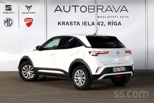 White Opel Mokka 2022 in Riga, with an engine capacity of 1.20 L and mileage of 68 thousand km for 15490 €, photo 6 on AUTOMOTO.COM.LV