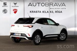 White Opel Mokka 2022 in Riga, with an engine capacity of 1.20 L and mileage of 68 thousand km for 15490 €, photo 9 on AUTOMOTO.COM.LV