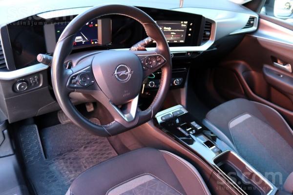 White Opel Mokka 2022 in Riga, with an engine capacity of 1.20 L and mileage of 68 thousand km for 15490 €, photo 9 on AUTOMOTO.COM.LV