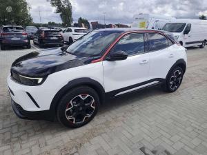 White Opel Mokka 2022 in Taurage, with an engine capacity of 1.20 L and mileage of 130 thousand km for 12463 €, photo  on AUTOMOTO.COM.LV