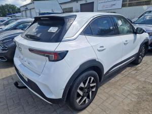 White Opel Mokka 2023 in Kaunas, with an engine capacity of 1.20 L and mileage of 65 thousand km for 9300 €, photo 6 on AUTOMOTO.COM.LV