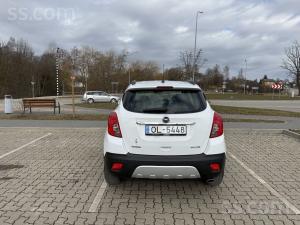 White Opel Mokka 2013 in Saldus, with an engine capacity of 1.70 L and mileage of 243 thousand km for 5590 €, photo 7 on AUTOMOTO.COM.LV