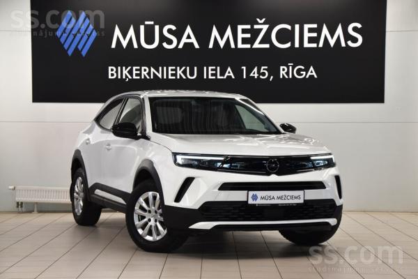 White Opel Mokka 2023 in Riga, with an engine capacity of 1.50 L and mileage of 113 thousand km for 11990 €, photo 3 on AUTOMOTO.COM.LV