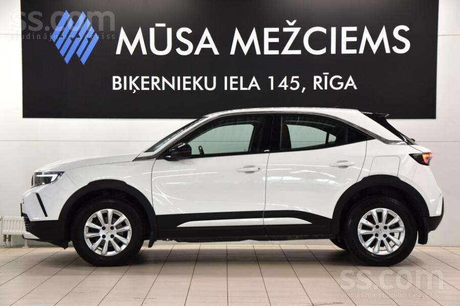 White Opel Mokka 2023 in Riga, with an engine capacity of 1.50 L and mileage of 113 thousand km for 10990 €, photo 6 on AUTOMOTO.COM.LV
