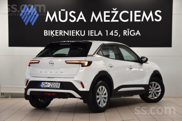 White Opel Mokka 2023 in Riga, with an engine capacity of 1.50 L and mileage of 113 thousand km for 10990 €, photo 6 on AUTOMOTO.COM.LV