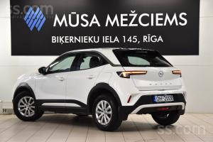 White Opel Mokka 2023 in Riga, with an engine capacity of 1.50 L and mileage of 113 thousand km for 10990 €, photo 9 on AUTOMOTO.COM.LV
