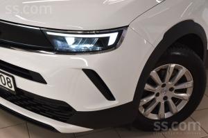 White Opel Mokka 2023 in Riga, with an engine capacity of 1.50 L and mileage of 113 thousand km for 10990 €, photo 11 on AUTOMOTO.COM.LV