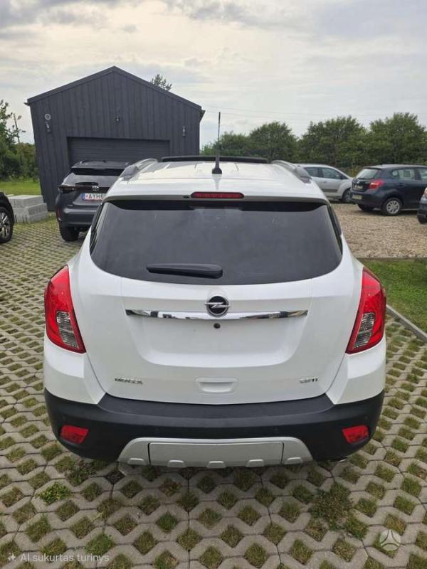 White Opel Mokka 2016 in Ukmerge, with an engine capacity of 1.60 L and mileage of 161 thousand km for 12000 €, photo 7 on AUTOMOTO.COM.LV