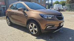 Brown Opel Mokka X 2017 in Siauliai, with an engine capacity of 1.60 L and mileage of 167 thousand km for 3299 €, photo  on AUTOMOTO.COM.LV