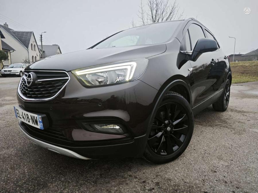 Red Opel Mokka X 2017 in Panevezys, with an engine capacity of 1.60 L and mileage of 188 thousand km for 5850 €, photo 1 on AUTOMOTO.COM.LV