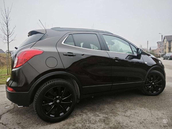 Red Opel Mokka X 2017 in Panevezys, with an engine capacity of 1.60 L and mileage of 188 thousand km for 5850 €, photo 4 on AUTOMOTO.COM.LV