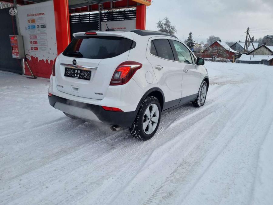 White Opel Mokka X 2017 in Ukmerge, with an engine capacity of 1.40 L and mileage of 137 thousand km for 10950 €, photo 6 on AUTOMOTO.COM.LV